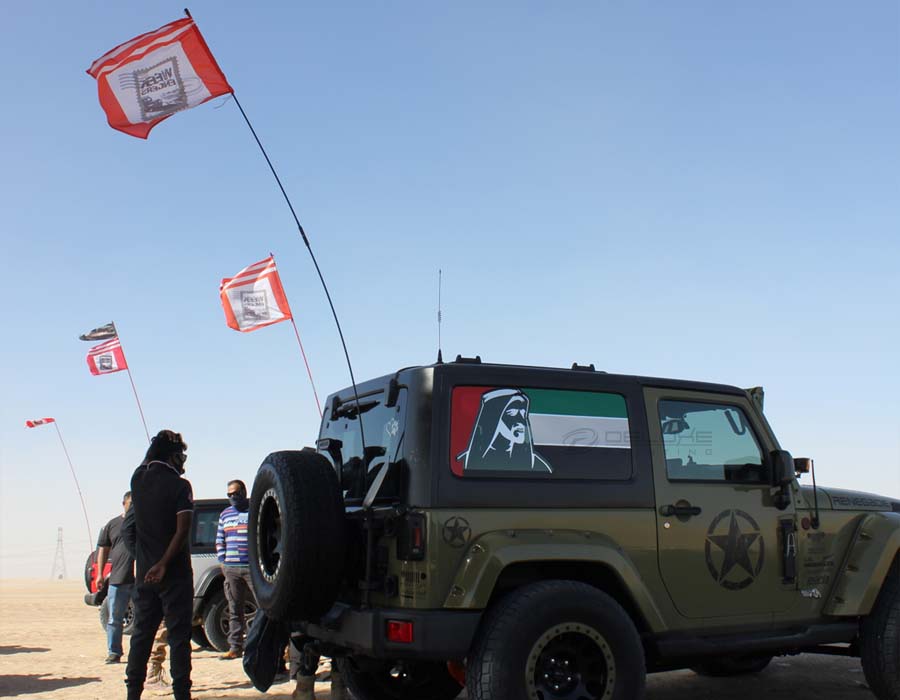Car desert flag dubai